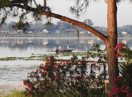 Fishermen at sunrise on Lake Miona in The Villages - Villages-News.com