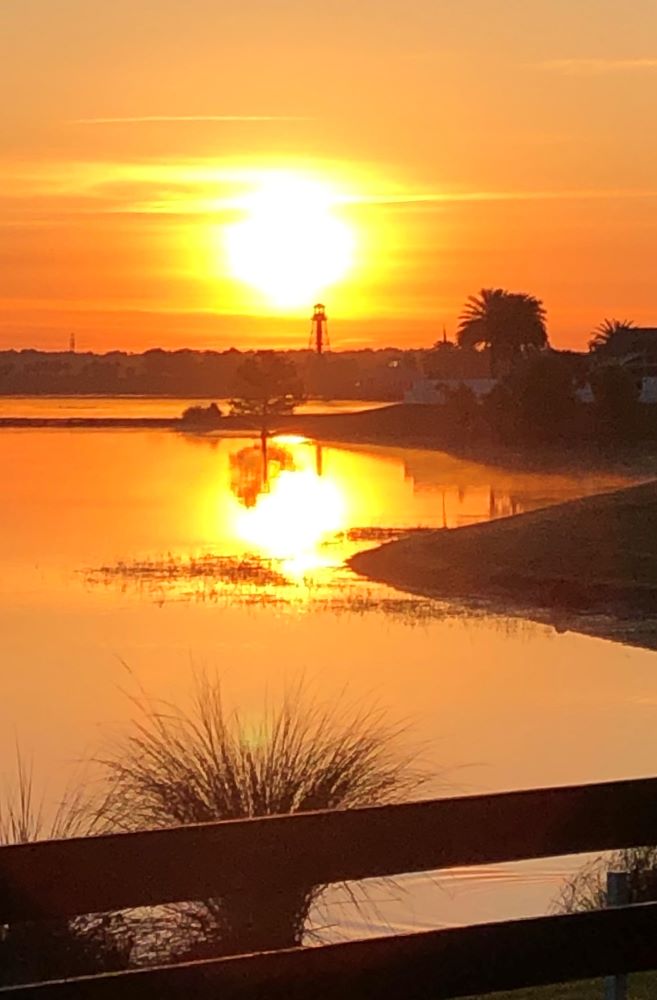 Vibrant Sunrise Captured at Lake Sumter Landing - Villages-News.com