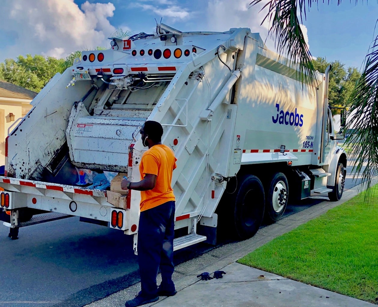 One of three crew members cut from trash trucks in The Villages ...