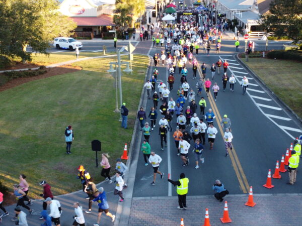 More than 700 runners brave cold in Running of the Squares 5K ...