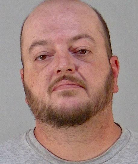 Driver who failed to pay fine jailed after caught back behind wheel ...