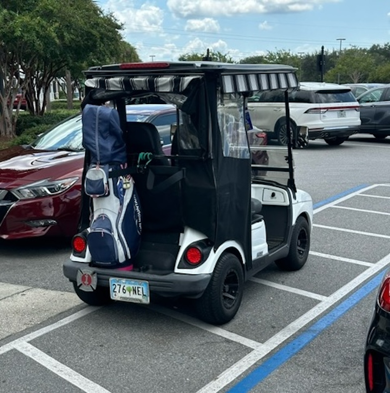 Bad golf cart parking at Colony Plaza - Villages-News.com