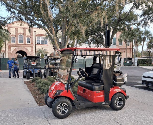 Golf cart scores VIP sidewalk parking at Spanish Springs - Villages ...